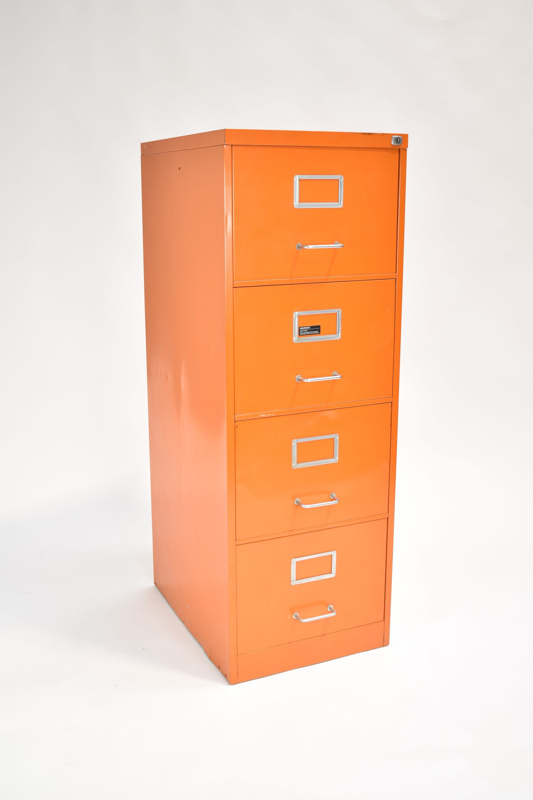 Orange 4 Drawer Metal Filing Cabinet - The Classic Modern Prop Hire Company